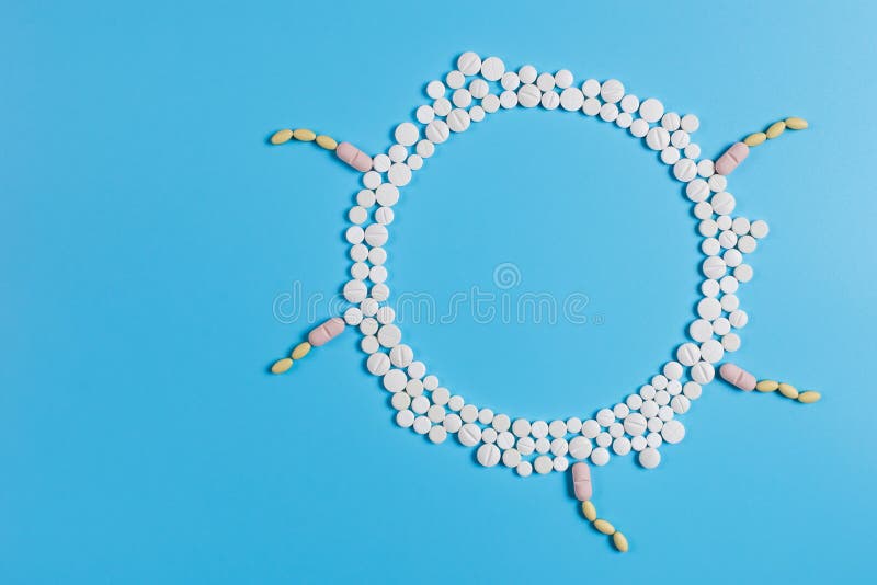 The Circle is Made Up of White Tablets on a Blue Background Stock Photo ...
