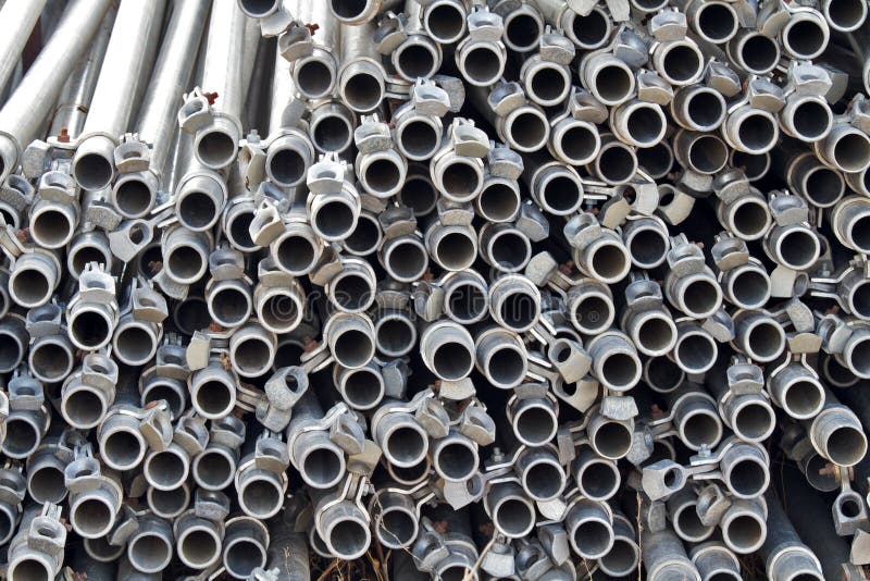 Circle Patterns in Stacked Metal Pipes Stock Image - Image of pile ...
