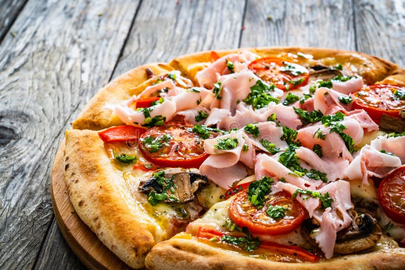 Circle Pizza with Boiled Ham Tomatoes and Mushrooms on Wooden Table ...