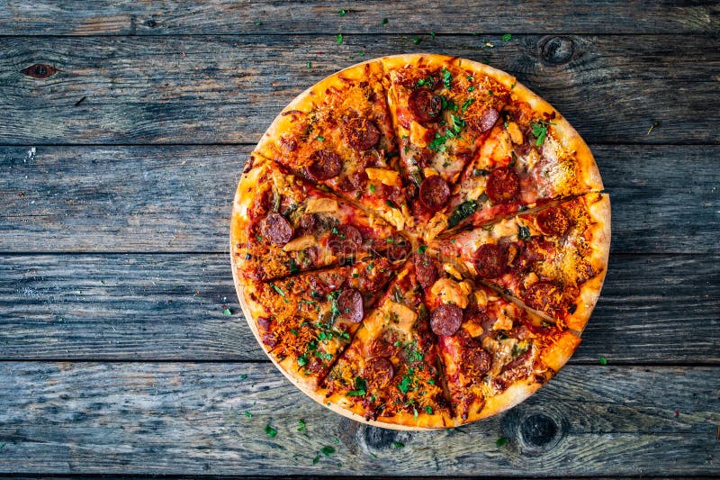 Circle Pizza Chorizo with Chicken Nuggets and Mozzarella, on Wooden ...