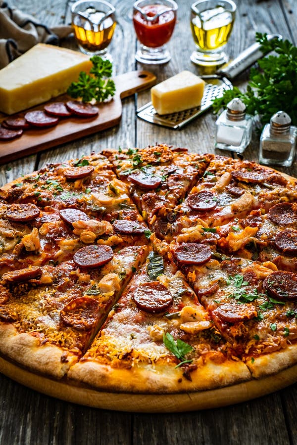 Circle Pizza Chorizo with Chicken Nuggets and Mozzarella, on Wooden ...