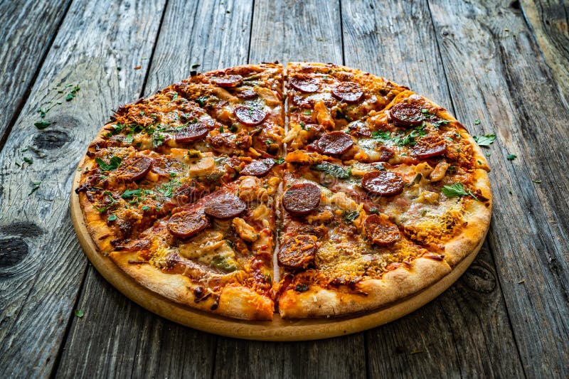 Circle Pizza Chorizo with Chicken Nuggets and Mozzarella, on Wooden ...