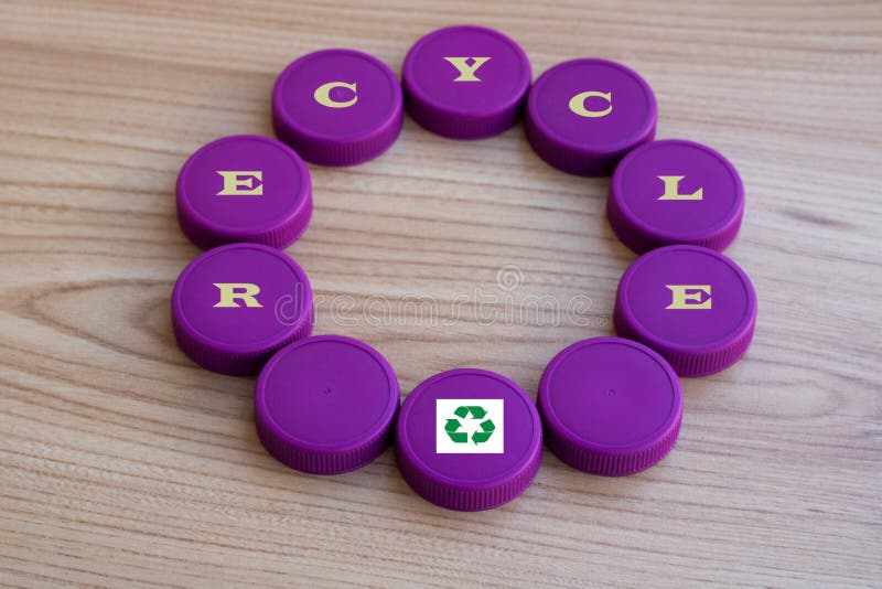 A Circle of Plastic Caps, with the Logo of Recycling,as a Backdrop ...
