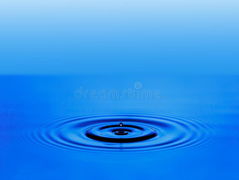 The Circle Ripple of the Surface of the Blue Water. Stock Photo - Image ...