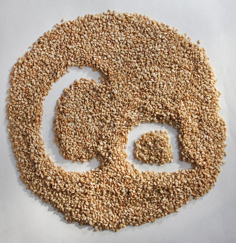 Circle from Sesame Seeds with Letters Stock Image - Image of closeup ...