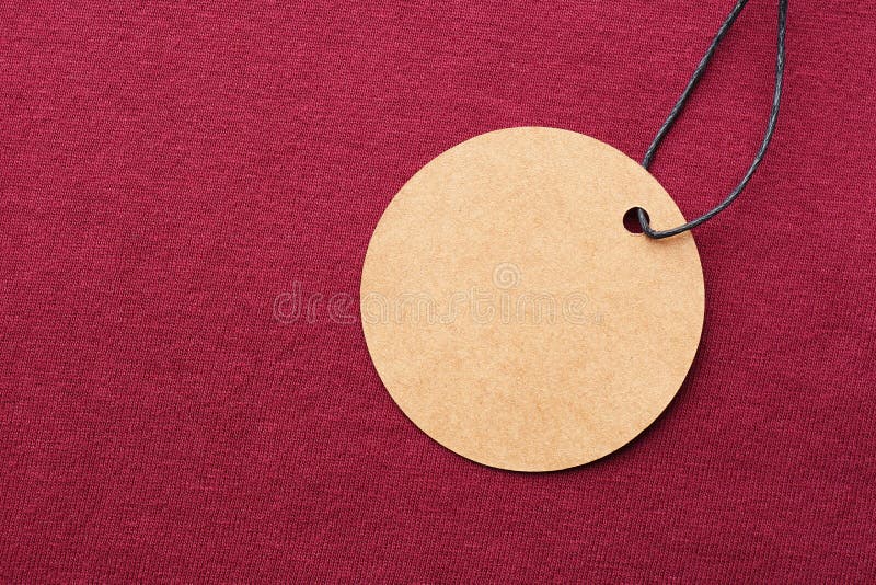 Circle Shaped Tag with Space for Text on Dark Red Fabric, Top View ...