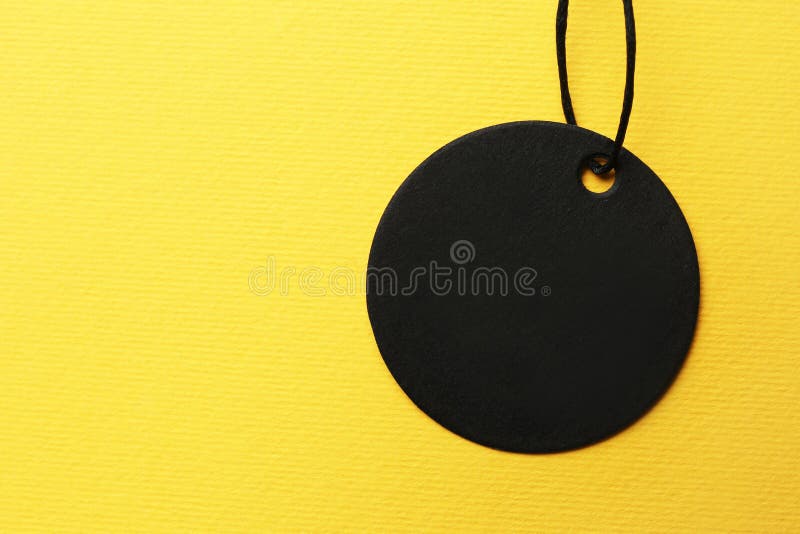 Circle Shaped Tag with Space for Text on Yellow Background, Top View ...