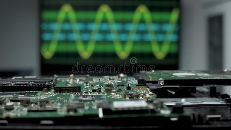 Circuit Board and Oscilloscope Display Electronic Signals in Laboratory ...