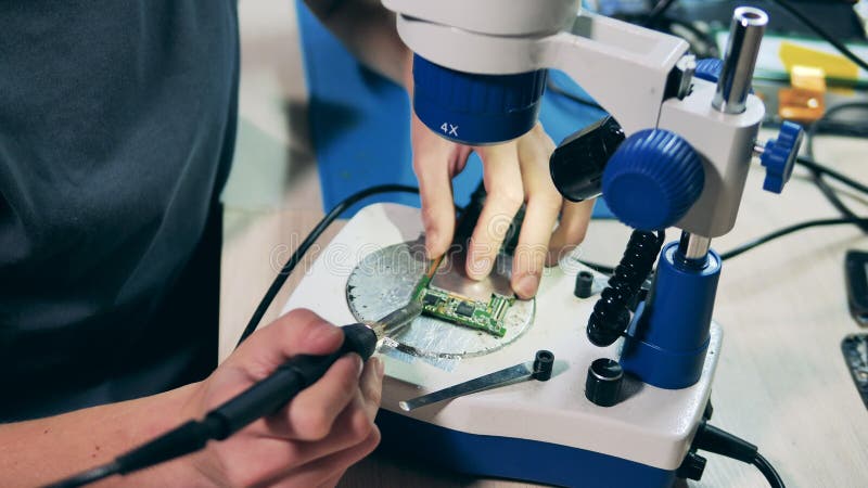 Circuit is Getting Fixed Under a Microscope Stock Footage - Video of ...