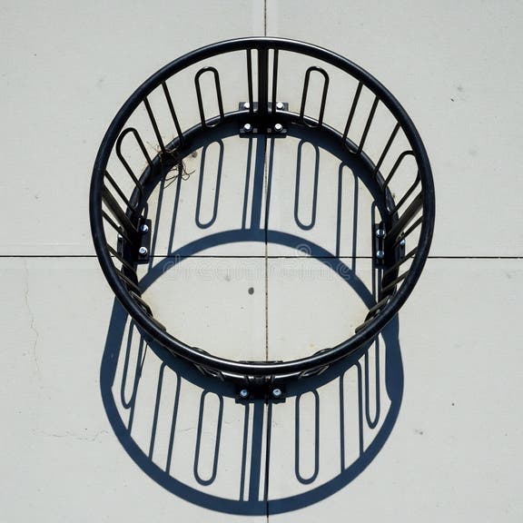 Circular Bicycle Rack with Strong Shadow on Pavement Stock Illustration ...