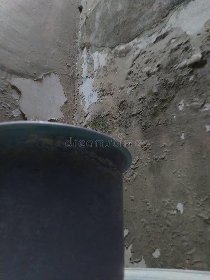 Circular Dark Object on Weathered Grey Wall, Abstract Close-up Stock ...