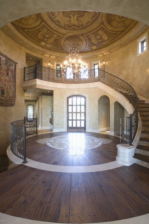 Large Foyer with Circular Staircase Stock Image - Image of residential ...