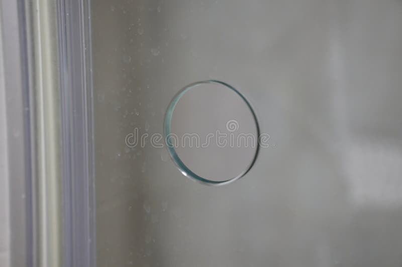 Circular Glass Cutout in Transparent Surface Stock Image - Image of ...