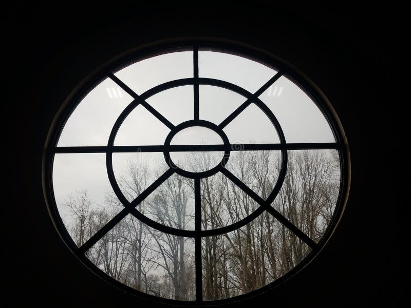 Circular Glass Window with Trees and Branches Stock Image - Image of ...