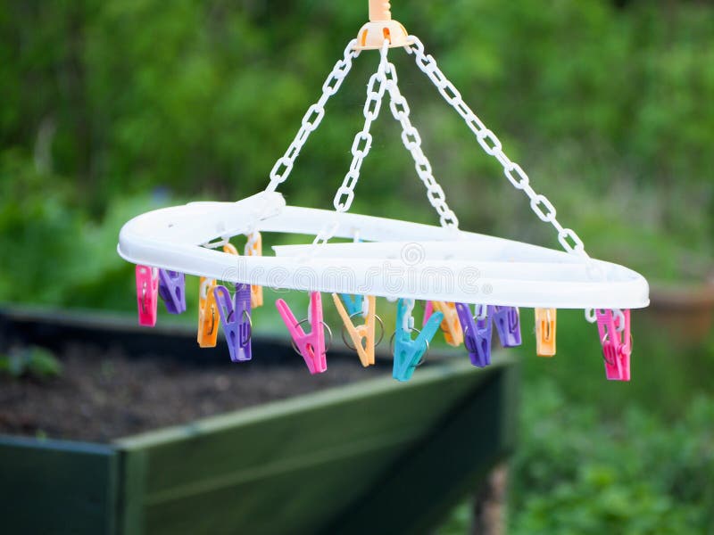 A Circular Hanging Close Drying Device with Multiple Colourful Pegs ...
