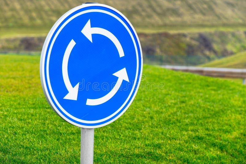 Circular Junction Road Sign Stock Image - Image of round, pole: 31778455