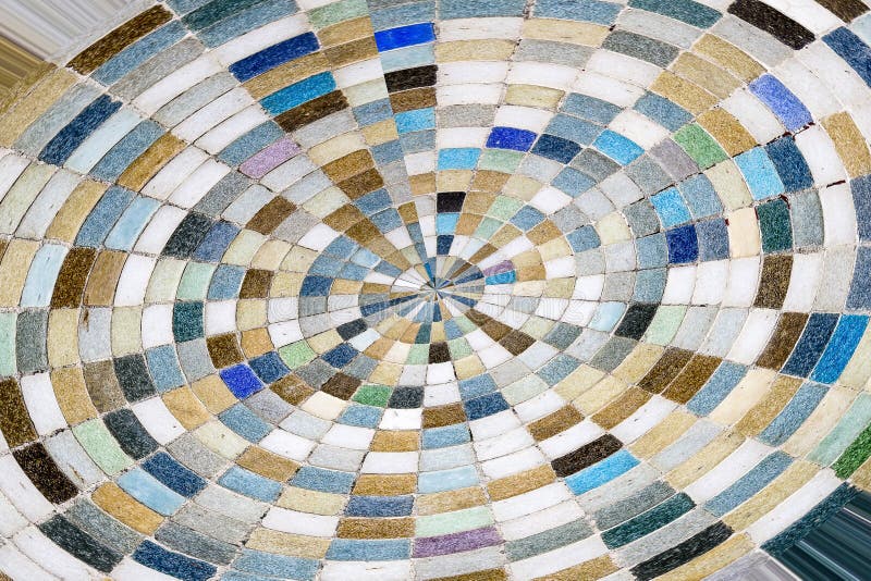 Circular Pattern with Multi-colored Small Tiles on a Wall Stock Photo ...