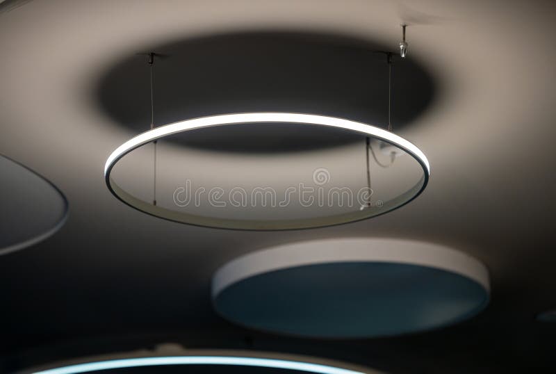 Circular Pendant Lights Hanging from the Ceiling Stock Image - Image of ...