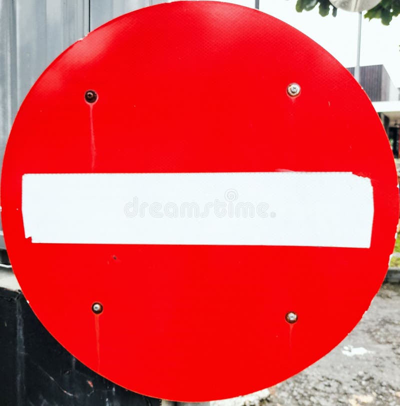 Circular Red No Entry Sign with White Horizontal Bar in Urban ...