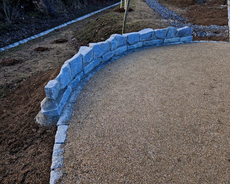 Circular Rest Stop with an Obelisk at the End of Path in the Park ...