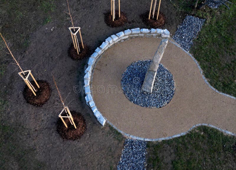 Circular Rest Stop with an Obelisk at the End of Path in the Park ...