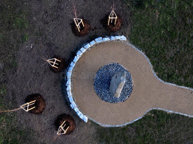 Circular Rest Stop with an Obelisk at the End of Path in the Park ...