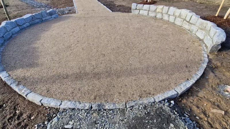 Circular Rest Stop with an Obelisk at the End of Path in the Park ...