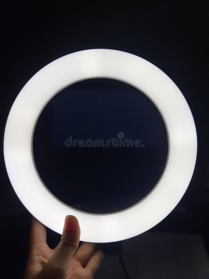 A Circular Ring-shaped Lamp Designed To Be Placed Directly in Front of ...