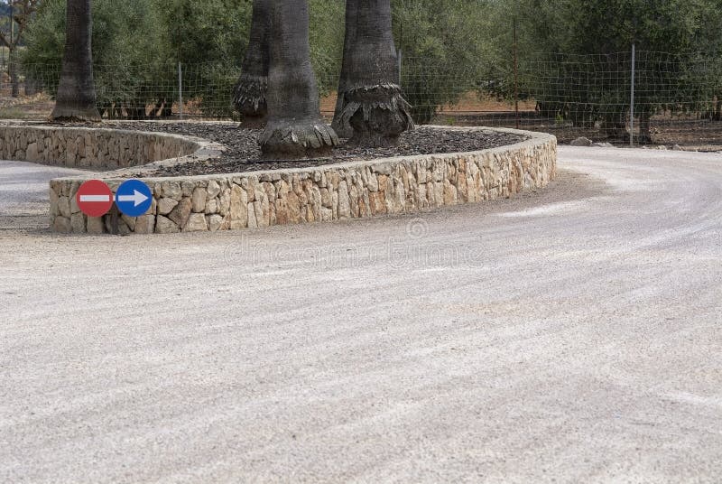 Circular Road Signs Direction Stone Wall Stock Image - Image of city ...