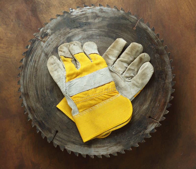 Circular saw and gloves stock photo. Image of rotary - 35504110