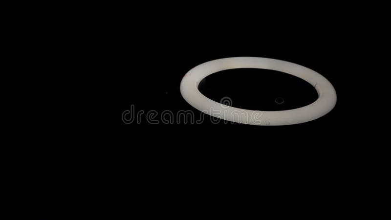 O Shaped White Disk Floats through Frame Stock Footage - Video of fight ...