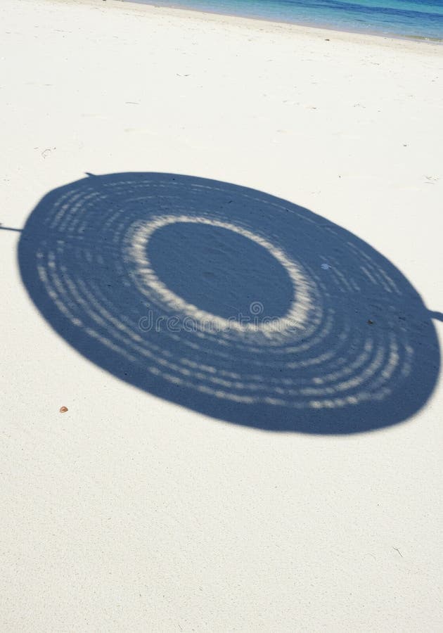 Circular Shadow on Sandy Beach Stock Illustration - Illustration of ...