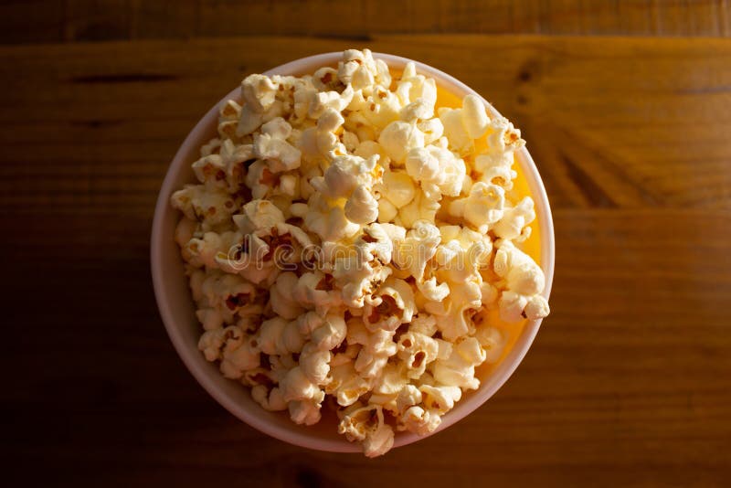 A bowl full of popcorn. stock photo. Image of closeup - 268374064