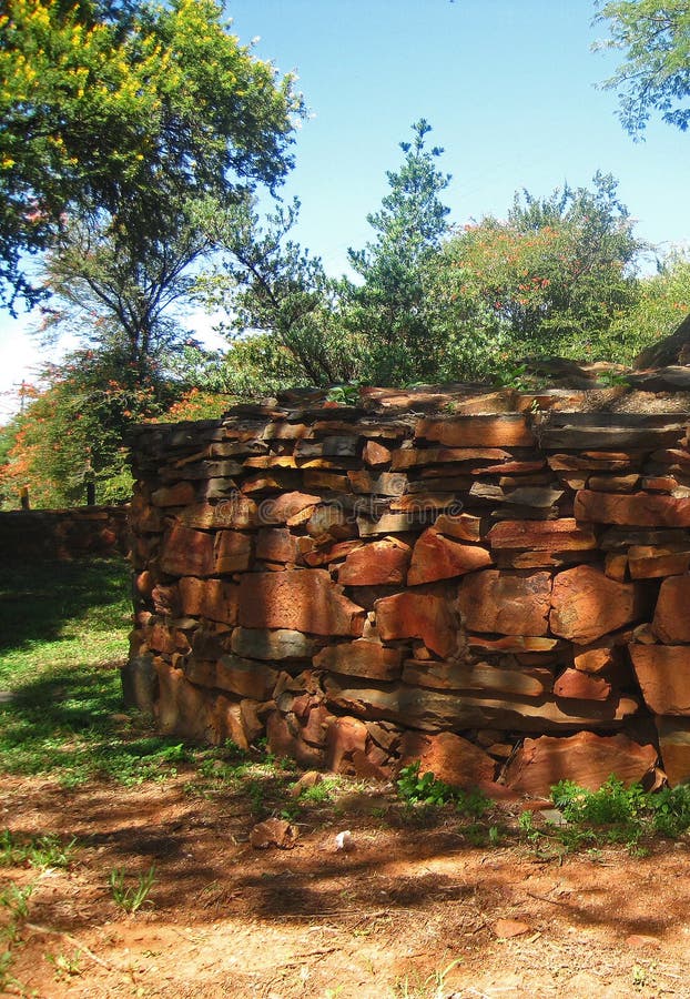 Circular Stone Wall in the Shade of Trees Stock Photo - Image of light ...