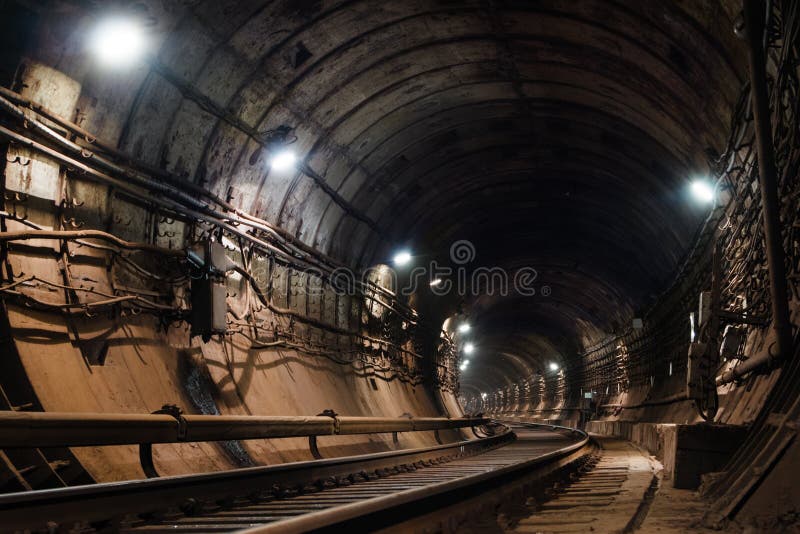 Circular Tunnel Subway Rails and Sleepers Turns Right and is ...