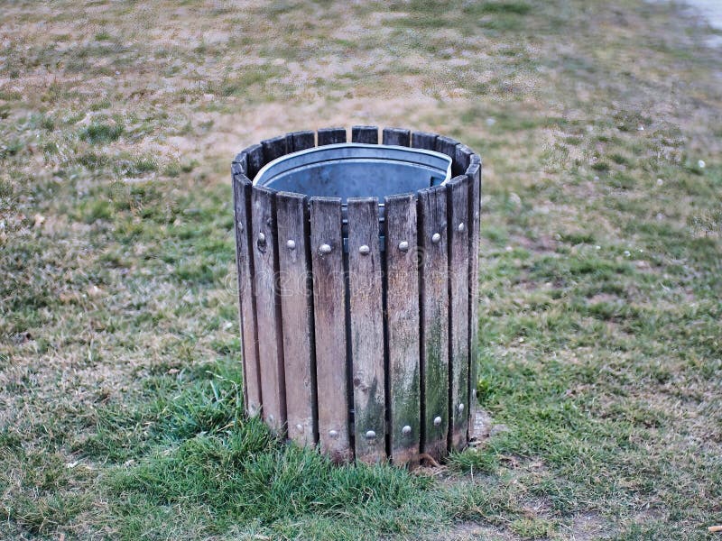 Circular Timber Slatted Outdoor Bin in a Dry Field Stock Photo - Image ...
