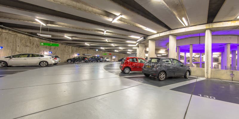 Cars in Circular Underground Parking Garage Stock Image - Image of ...