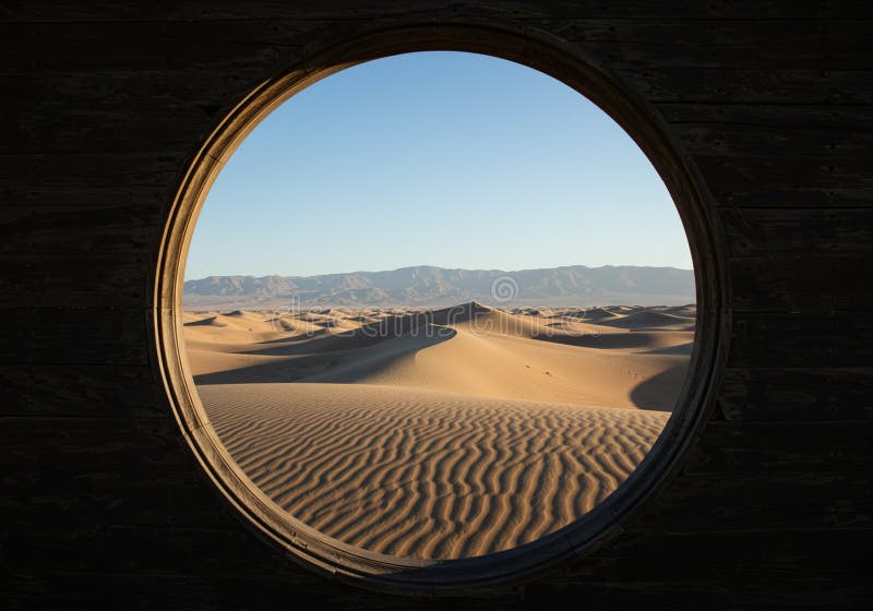 A Circular Window Frames a Desert Landscape with Undulating Sand Dunes ...
