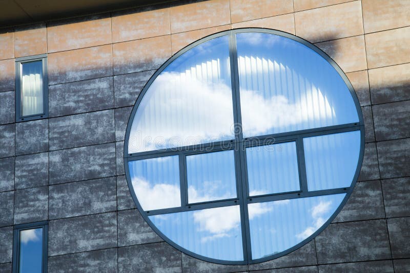 Circular Window Reflecting a Blue Sky Stock Photo - Image of ...