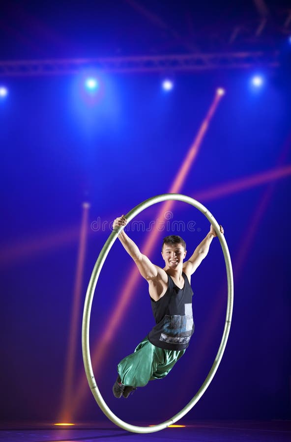 Circus Artist in a Cyr Wheel Stock Photo - Image of arena, gymnastics ...