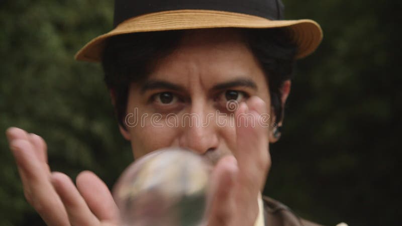 Circus Performer is Practicing a Trick Using a Crystal Ball Stock ...
