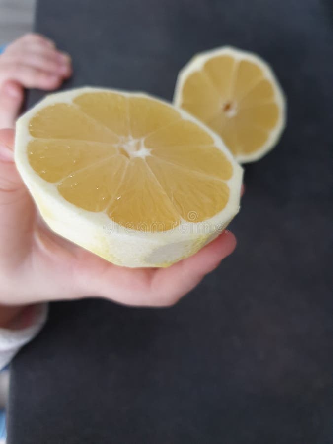 Citric stock photo. Image of peeled, inhand, citric - 142159780