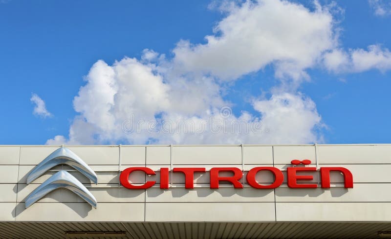 Citroen Logo on Dealership Facade with Blue Cloudy Sky on Background ...