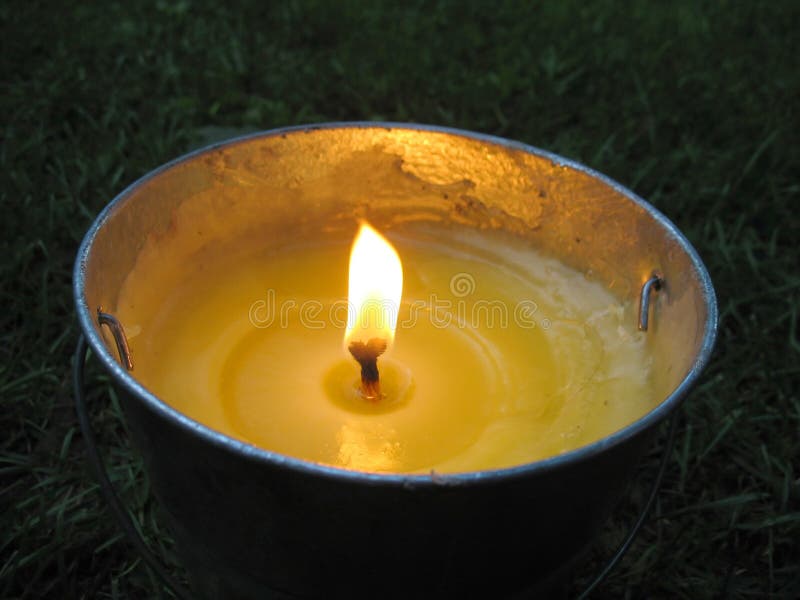 Citronella bucket candle stock image. Image of flaming - 4834975