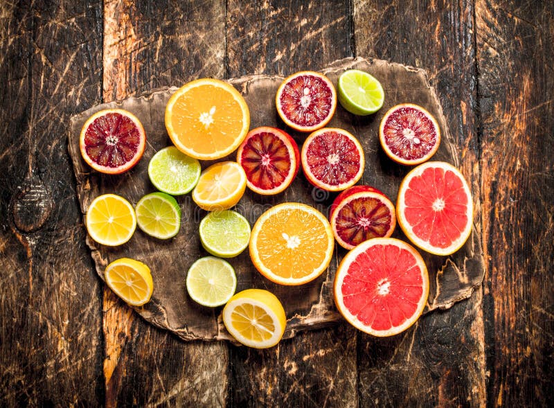 Citrus Background. Fresh Citrus Fruit on a Cutting Board Stock Image ...