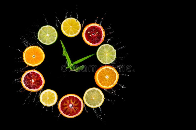 Citrus Clock Time Concept Fresh Fruit Slices and Refreshing Time ...