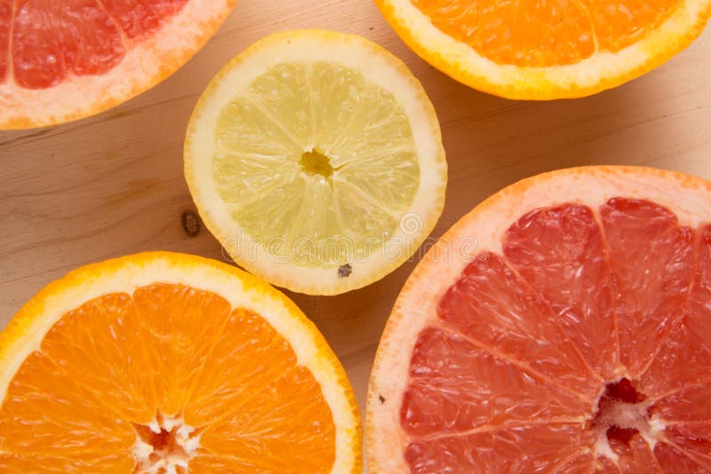 The Citrus Cut by Circles Lies on a Table. Orange, Lemon, Grapefruit ...