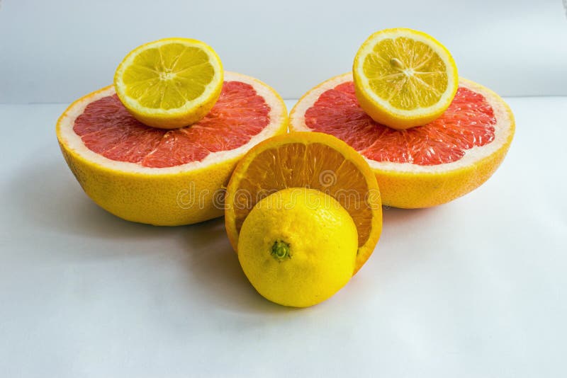 Citrus Fruits Being Cut in Half Stock Photo - Image of group, mixed ...