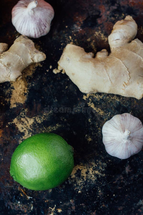 Citrus Fruits with Garlic and Ginger Root Stock Photo - Image of rustic ...