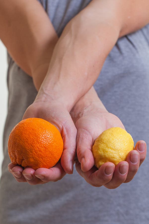 Citrus fruits in hands. stock image. Image of body, orange - 32562665